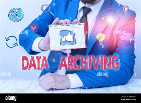 Conceptual Hand Writing Showing Data Archiving Concept Meaning To Secure And To Store Data For