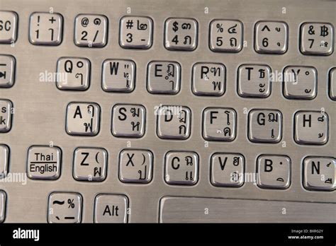 Thai Qwerty Computer Keyboard With Thai Writing And Characters In Bangkok Thailand Stock Photo