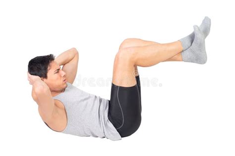 Strong Sportsman In Activewear Performing Abdominal Crunches Stock