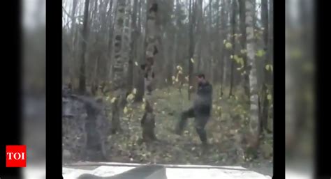 Viral Video Shows Tree Falling Over Man S Head Times Of India