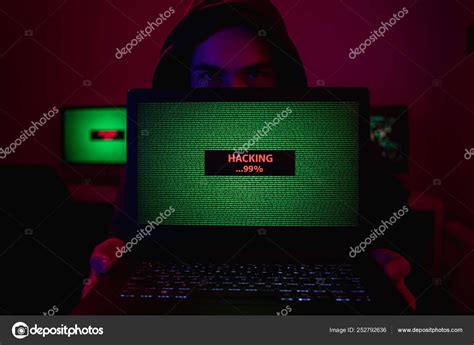 Man Showing Laptop With Hacking Process Stock Photo Kegfire