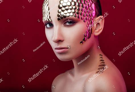 Portrait Of A Woman With Squama Like Sequins On Her Face Beauty