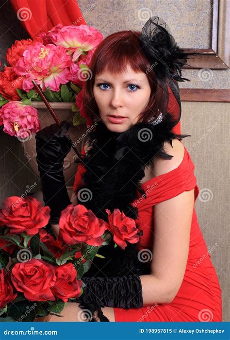 Legged Redhead Model In Red Minidress Posing In Studio Stock Image Image Of High Girl
