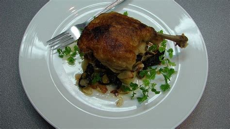 Confit Duck Legs With Parsnip Prunes Thyme And Almond Vinaigrette