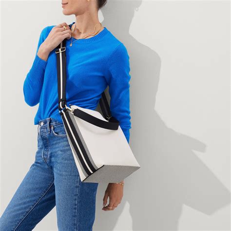 The Mini Zip Bucket In Ivory And Black Mini Bucket Bag Purses Rothys