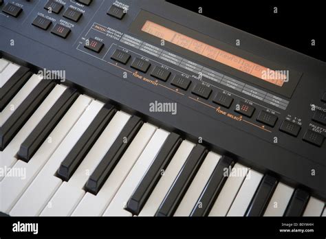 Digital Synthesizer With Keyboard LCD Screen Showing Program Information Stock Photo Alamy