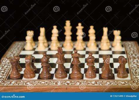 Closeup Of Chess Pieces On A Wooden Chess Board Stock Image Image Of