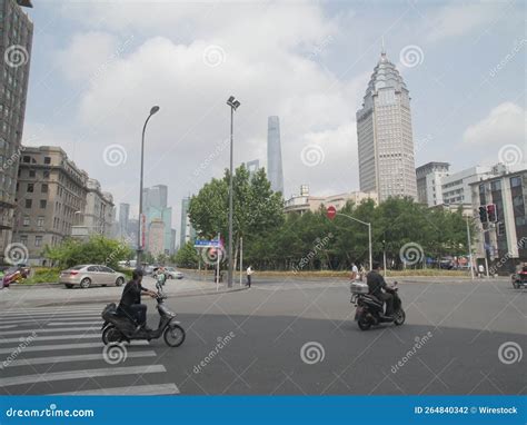 Scooters Pulling Into Intersection In Shanghai China Editorial