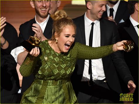 Adele Breaks Grammys Album Of The Year Statue In Half Photos Photo