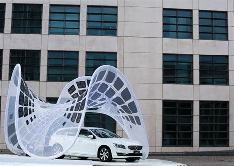 volvo pure tension pavilion that charges an electric car by synthesis