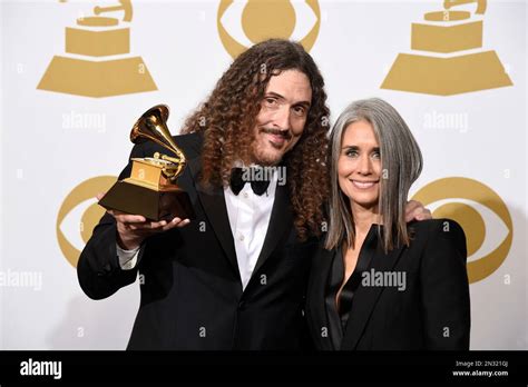 Weird Al Yankovic Left And Suzanne Krajewski Pose In The Press Room