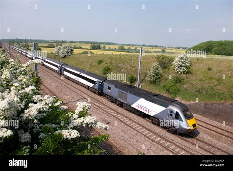 East Coast Class 43 125 High Speed Passenger Train Travelling At Speed Along The East Coast Main