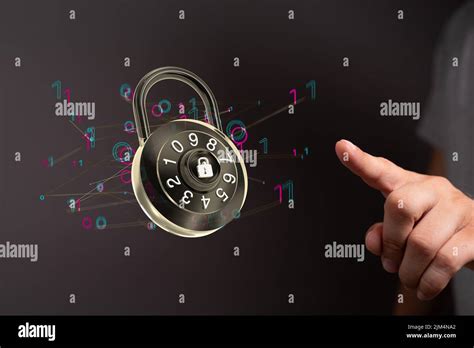 A Finger Touching A Digital Concept Of Security With Floating Padlock