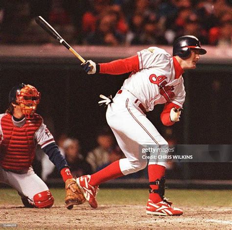 Jim Thome Of The Cleveland Indians And Javier Lopez Of The Atlanta