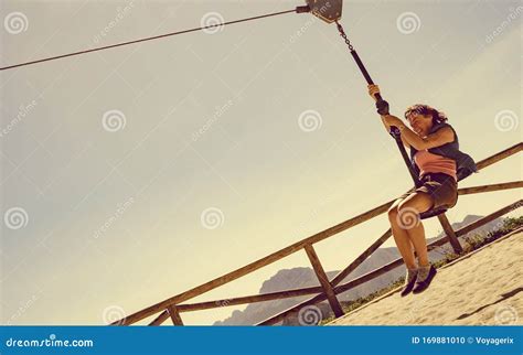 Adult Woman Having Fun On Zipline Stock Photo Image Of Mountains Tourist 169881010