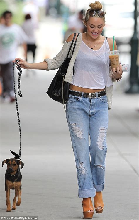Miley Cyrus Rocks Her New Hairstyle And Flashes Her Toned Abs Upon