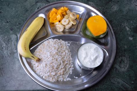 Traditional Nepali Dahi Chiura With Curd Rice Flakes Mango And