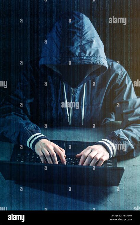 Anonymous Hacker Programmer Uses A Laptop To Hack The System Stealing Personal Data Creation