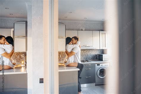 Reflection In Glass In A Mirror Hot Couple In Love Man And Woman Slowly Undress Each Other