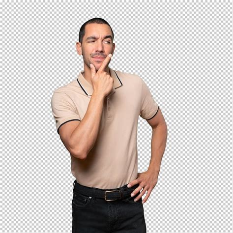 Premium Psd Concentrated Young Man Making A Gesture Of Distrust