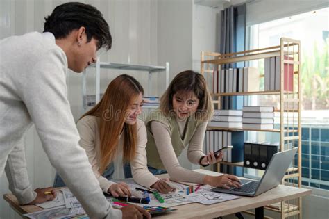 Ux Developer And Ui Designer Team Collaboration And Brainstorming Ideas In Modern Office