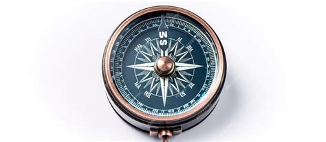 Premium Photo Closeup Of A Compass On A White Background Used For