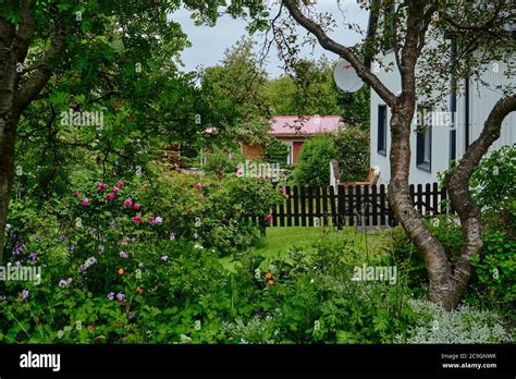 Architectural Details And Lush Garden Scenery In West Kópavogur 50s Reykjavík Working Class