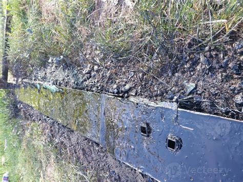 Spraying Liquid Bituminous Mastic On The Concrete Foundation For