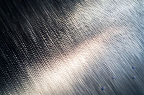 Metallic Brushed Steel Surface With Fine Linear Texture And Soft Light Reflection Stock