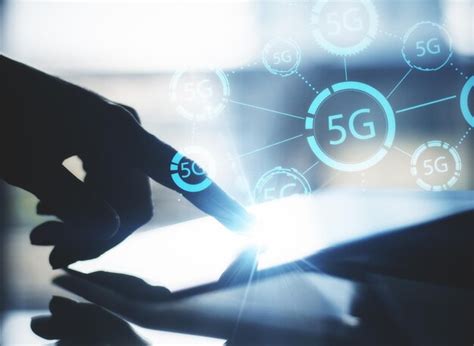 Premium Photo Close Up Of Hand Using Tablet With Glowing 5g Internet