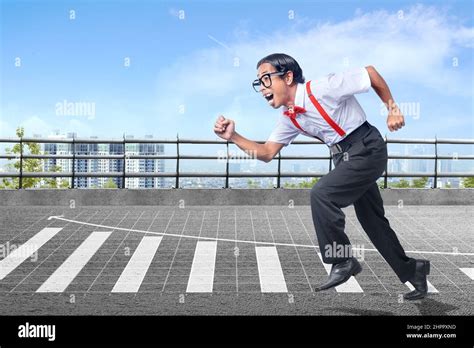 Asian Nerd With Ugly Face Running With Increases Graph On The Street Background Stock Photo Alamy