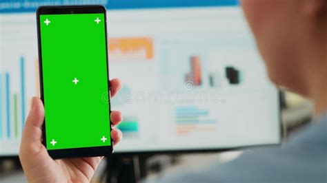 Business Person Holds Greenscreen Device Stock Footage Video Of Desk