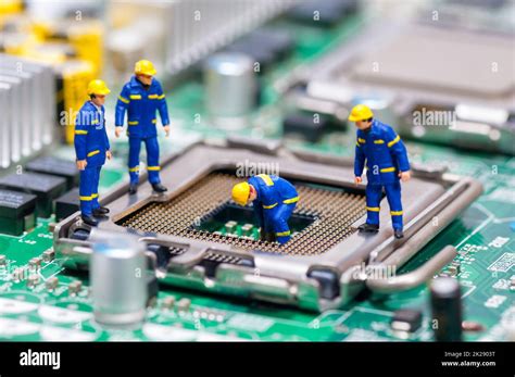 Group Of Construction Workers Repairing CPU Stock Photo Alamy