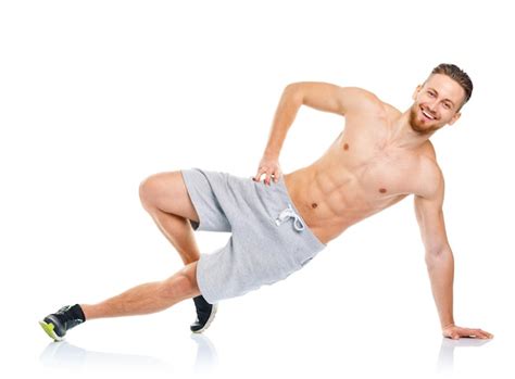 Premium Photo Sport Attractive Man Doing Fitness Exercises On The White Background