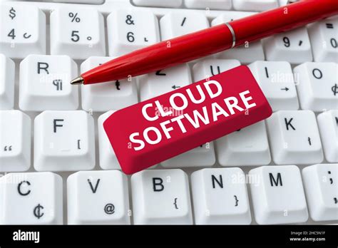 Hand Writing Sign Cloud Software Word Written On Programs Used In Storing Accessing Data Over