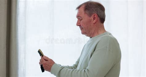 Elderly Man Thinking And Memory With Picture Frame And Mourning In