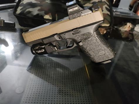 Gen 4 G19 with PSA Dagger slide RMR cut with Holosun HS507C. Decent way to get into red dots on ...
