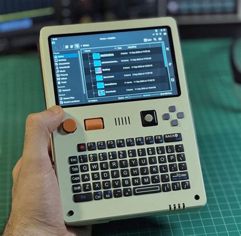 pilet 5 console is a raspberry pi powered handheld pc with a qwerty