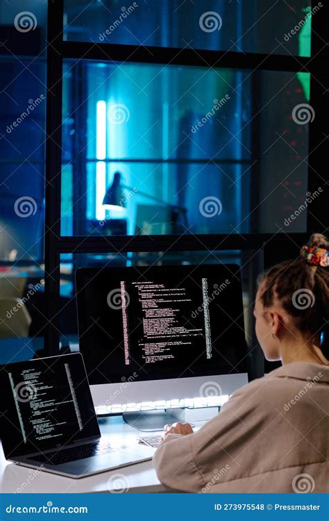 Young Female Software Developer Or Programmer Working With Coded Data