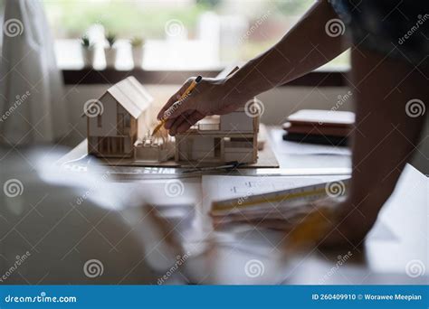 Architect Man Working With Blueprints For Architectural Plan Engineer Sketching A Construction