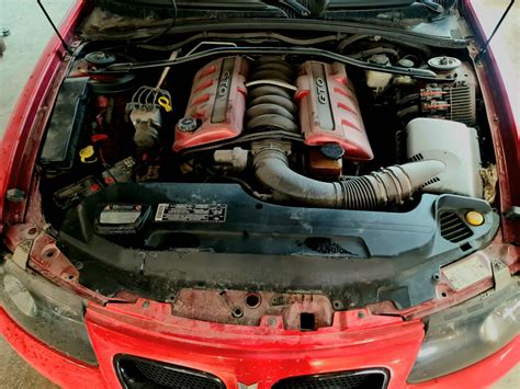 #13. Штатная накладка радиатора — Pontiac GTO, 6 л, 2006 года ...