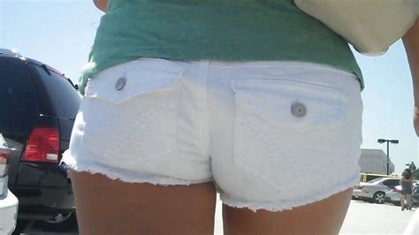 Girl In White Short Cutoff Jeans Showing Her Ass And Butt Porn Pictures