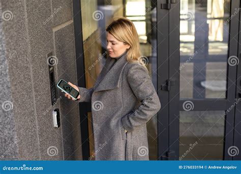 Female Entering Secret Key Code For Getting Access And Passing Building Using Application On