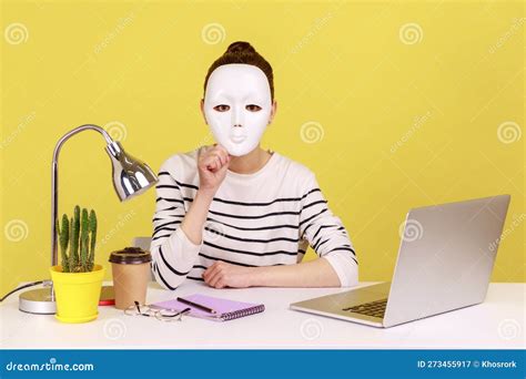 Woman Covering Her Face With White Mask Hiding Personality While