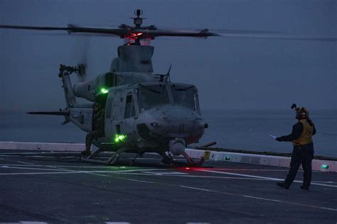 The Aviation Deck Landing Qualification A Us Navy Sailor With Uss