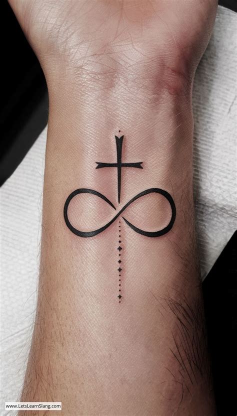 Infinite Faith Cross Tattoo In 2026 Wrist Tattoos For Women Cool