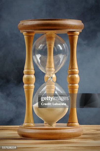 Empty Hourglass On Black Photos And Premium High Res Pictures Getty