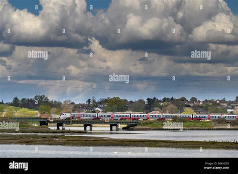 Class 745 Passenger Train In Greater Anglia Livery Crossing The