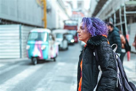 Premium Photo Adult Woman Walking On The City Street With Traffic