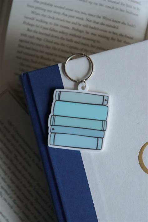 book stack keychain designs by a
